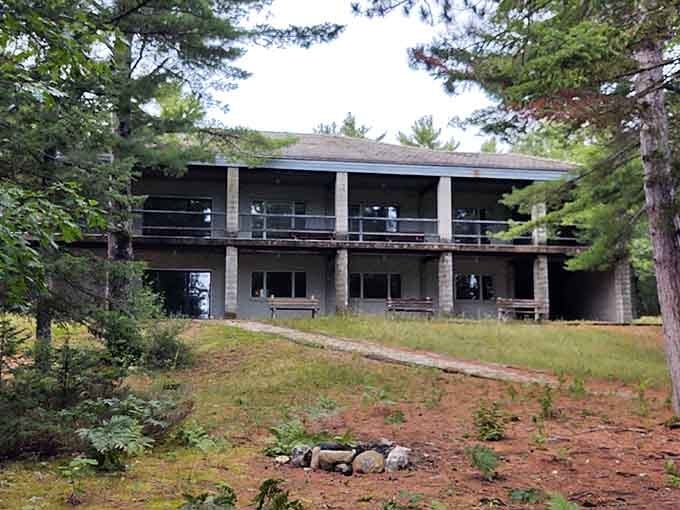 The historic Concrete Lodge stands quietly among the pines, a reminder of when this quarry buzzed with different activity.