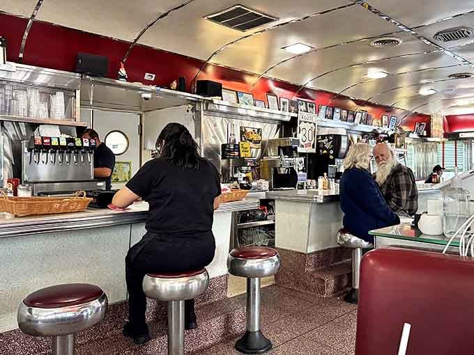 Real people enjoying real food in a real diner&mdash;no pretension, just pure American comfort food done right.