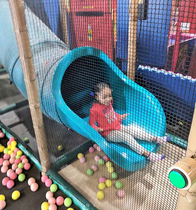 Tunnel slides twist through the play structure like colorful intestines, which sounds weird but kids absolutely love it anyway.