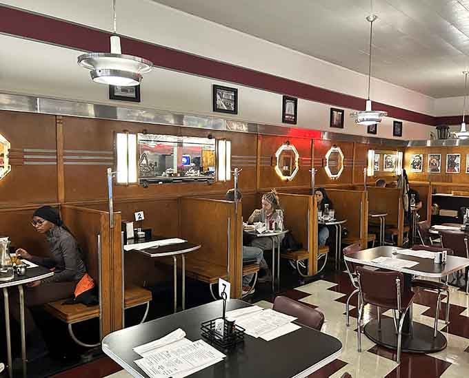 Classic diner booths offer cozy spots for intimate breakfasts, where the only decision is whether you'll need a nap afterward.