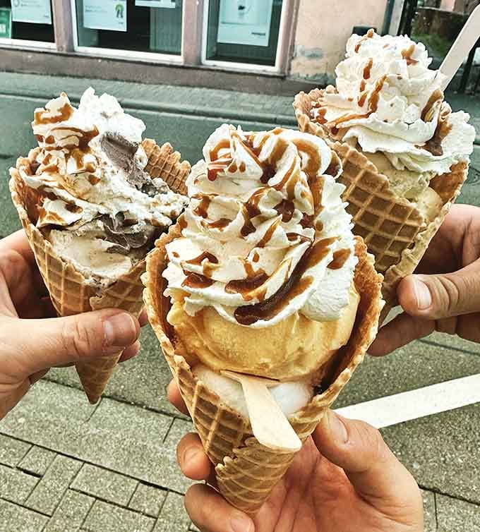 These towering cones demonstrate that gravity is merely a suggestion when you're committed to maximum ice cream enjoyment.