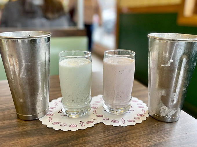 Those metal mixing cups mean serious business; these aren't milkshakes, they're thick, creamy commitments requiring dedication.