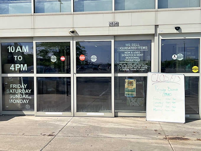The entrance hours promise Friday through Monday shopping adventures, with deals waiting inside those glass doors.