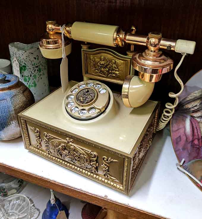 This rotary phone screams vintage elegance, back when calling someone required actual finger strength and remarkable patience.