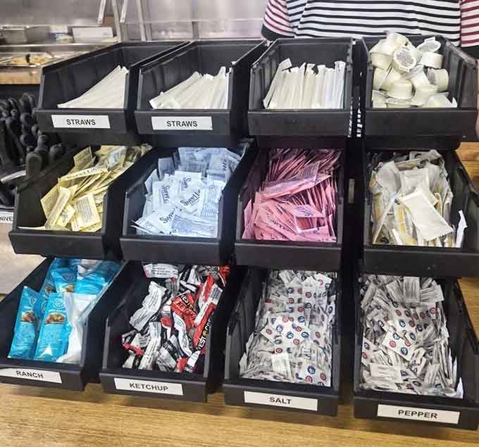 Organized condiments prove that even chaos can be delicious when properly labeled and easily accessible.