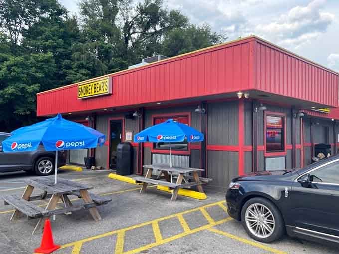 Outdoor seating with bright blue umbrellas for those perfect Kentucky days when barbecue tastes even better in sunshine.