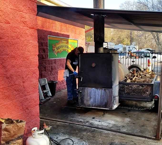 The outdoor smoker hard at work, where the magic happens and patience transforms meat into perfection.