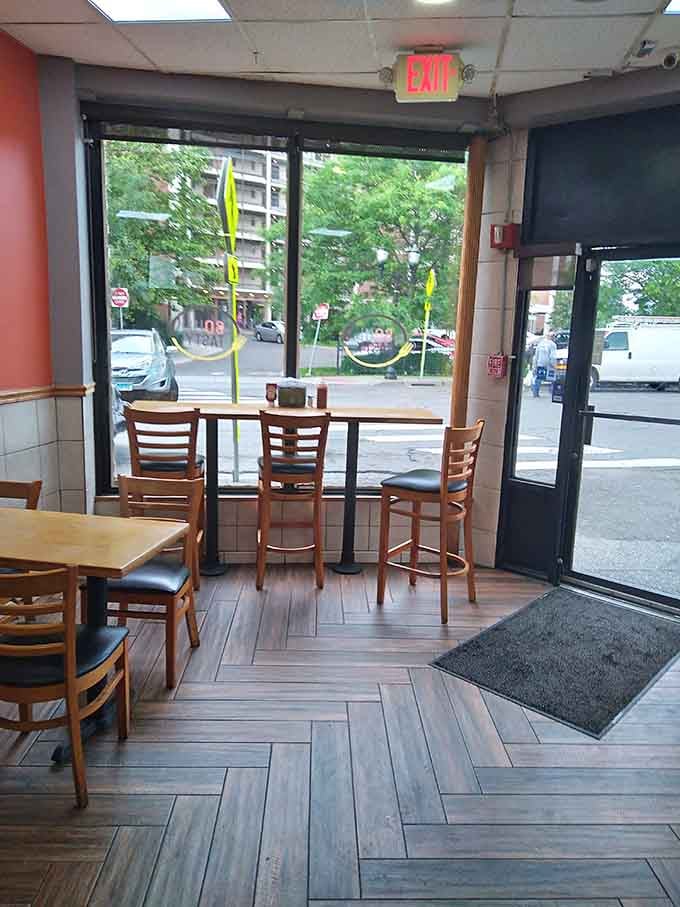 Window seating for people-watching while you enjoy your meal, combining two of life's simple pleasures into one experience.