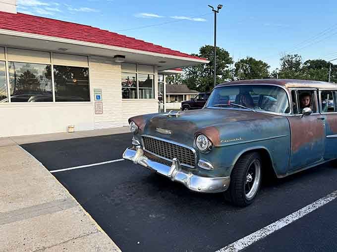 Even classic cars know where to find the good stuff, parking here like they've found automotive heaven.