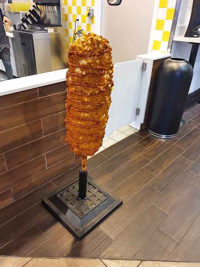 That towering display of spiral-cut potato perfection stands like a delicious monument to what's possible when creativity meets the deep fryer.