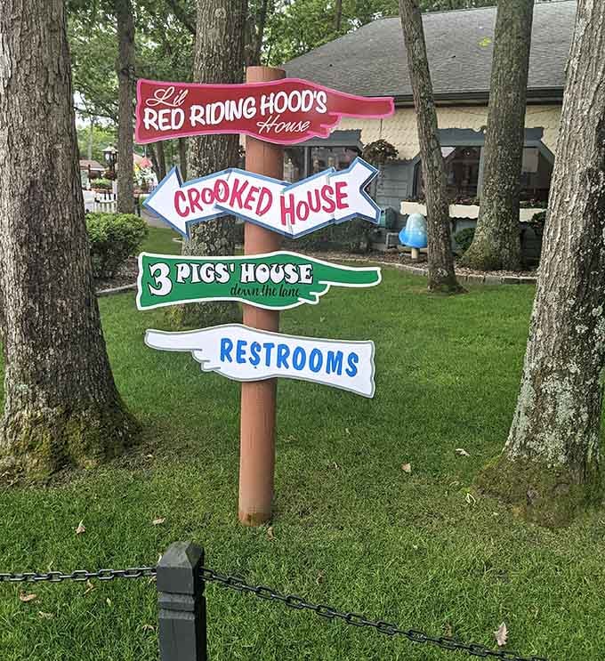 Follow the signs to adventure, restrooms, or crooked houses, because even fairy tale visitors need practical directions sometimes.