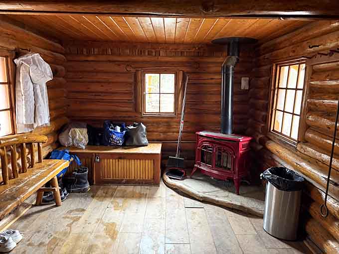 Inside the changing cabin, a wood stove keeps things cozy while you transition from regular human to relaxed puddle.