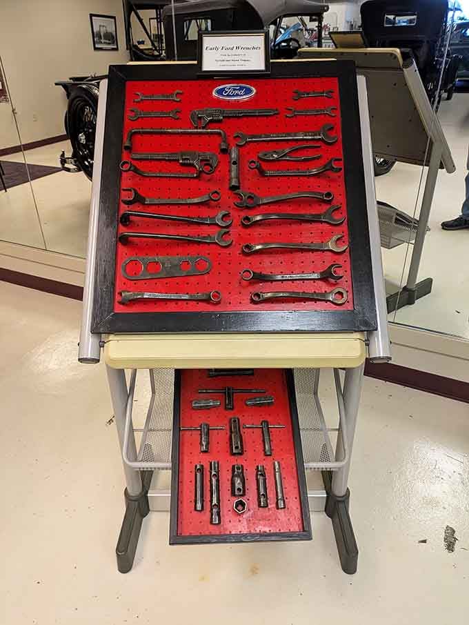 Even the period-correct tools get the museum treatment, displayed like the essential artifacts of automotive history they are.