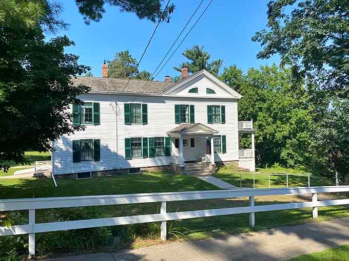 The Folsom House stands as a perfectly preserved time capsule, white picket fence and all, like history decided to pose nicely.