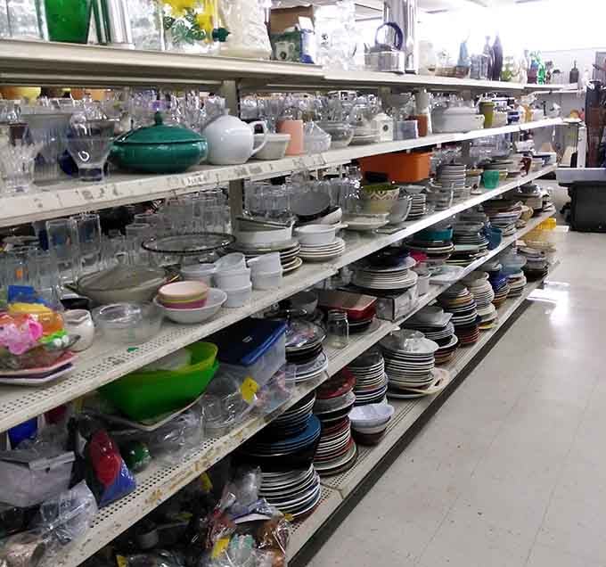 Kitchen items stacked like a culinary treasure chest, where someone's unused wedding gifts become your cooking arsenal.
