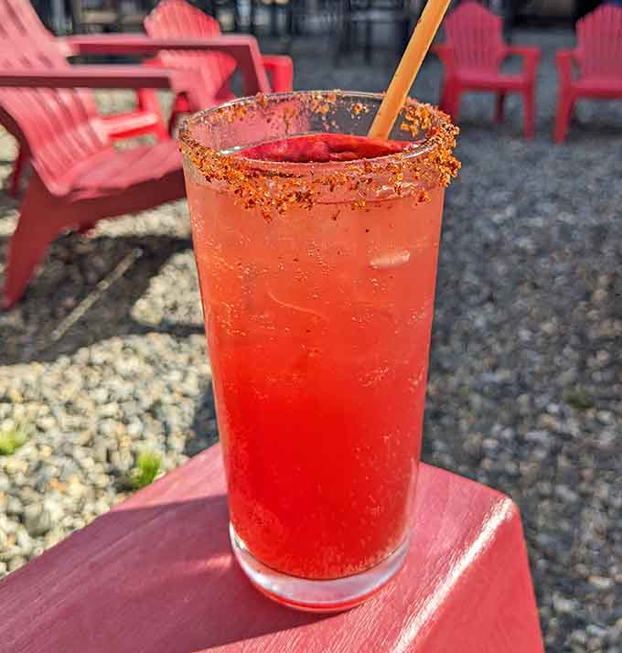 A refreshing drink with a spicy rim enjoyed on the patio: because great pizza deserves an equally thoughtful beverage companion.