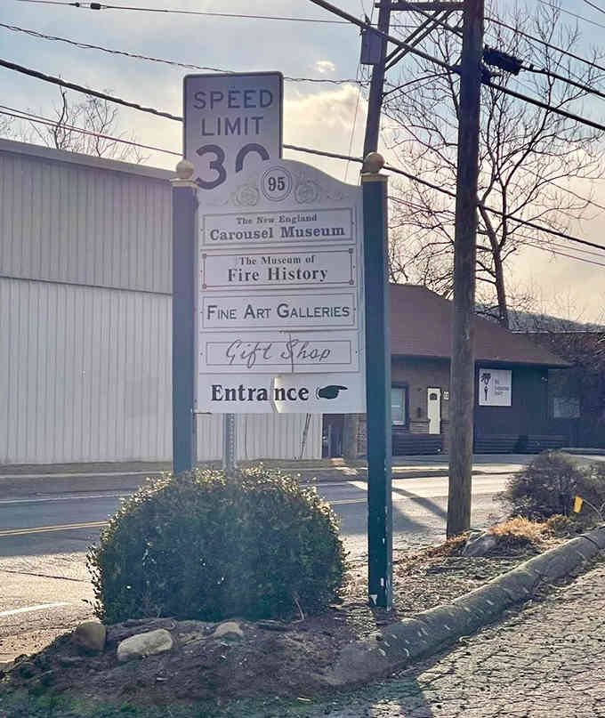 The unassuming roadside sign hides one of Connecticut's most delightful secrets just up that driveway there.