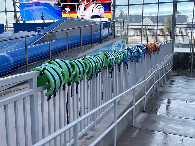Life vests lined up like colorful soldiers, ready to help the little ones navigate their aquatic adventures safely.