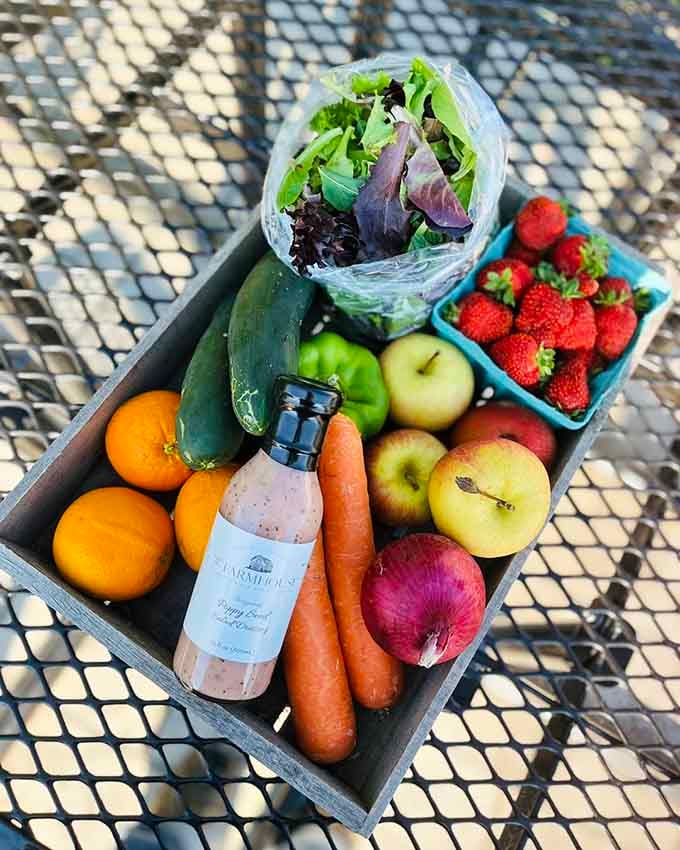 Farm-fresh produce arranged like nature's candy store, proving vegetables can be exciting when they're actually fresh.