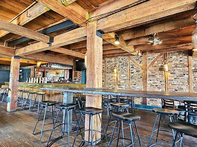 High-top seating and exposed timber beams create casual elegance that works for date night or Tuesday lunch equally well.