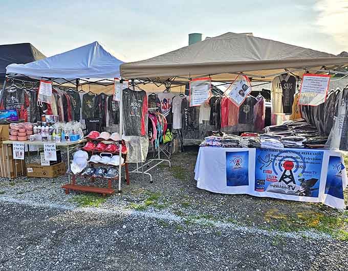 Outdoor vendor tents packed with clothing and caps, proving shopping doesn't require fancy boutiques or air conditioning.
