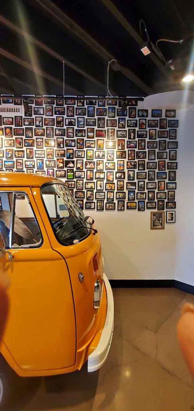 This wall of memories captures the faces and moments that make The Joy Bus more than just another breakfast spot.