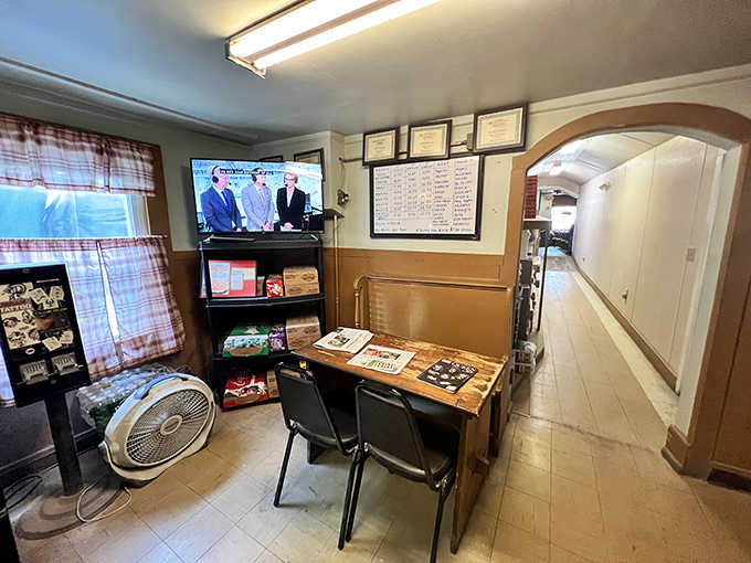 The waiting area where anticipation builds, complete with a TV and the kind of comfortable simplicity that feels like visiting family.