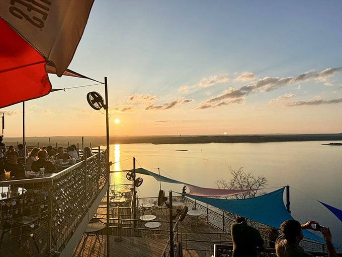 Golden hour over Lake Travis from the Oasis deck, the kind of view that makes you forget to check your phone.