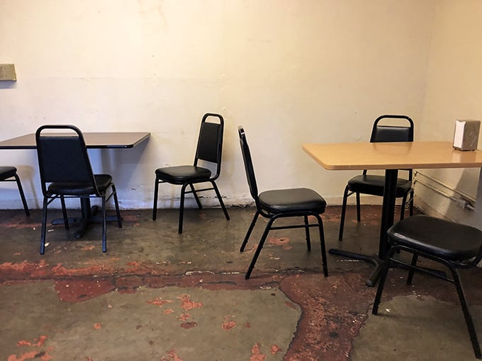 No fancy booths or designer chairs here, just honest seating for folks who came for the food.