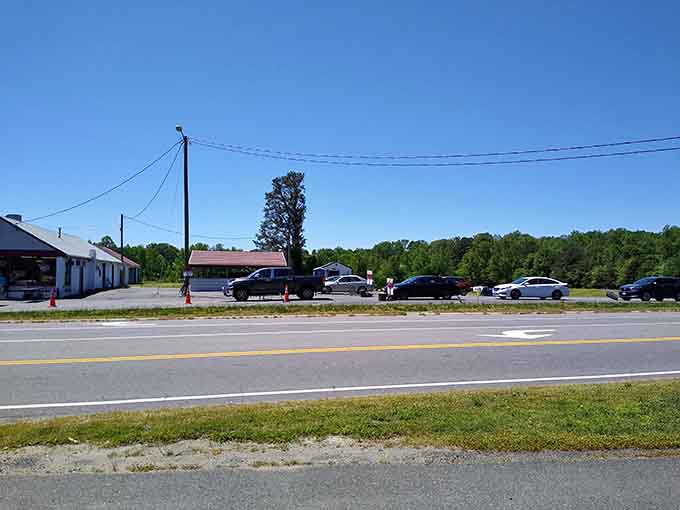 That line of cars stretching down the road? That's the daily pilgrimage to exceptional smoked meats.