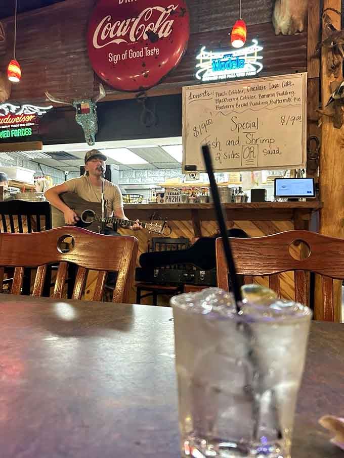 Live music and vintage Coca-Cola signs create the soundtrack and scenery for an authentic Texas dining experience.