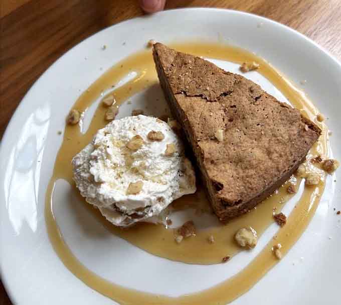 Dessert that arrives with caramel drizzle and whipped cream, because you drove this far&mdash;you're finishing strong.