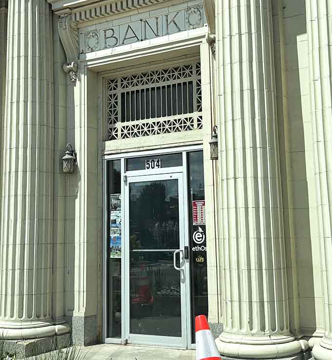 The word "BANK" above the entrance reminds you this building has stories that predate the pancakes.