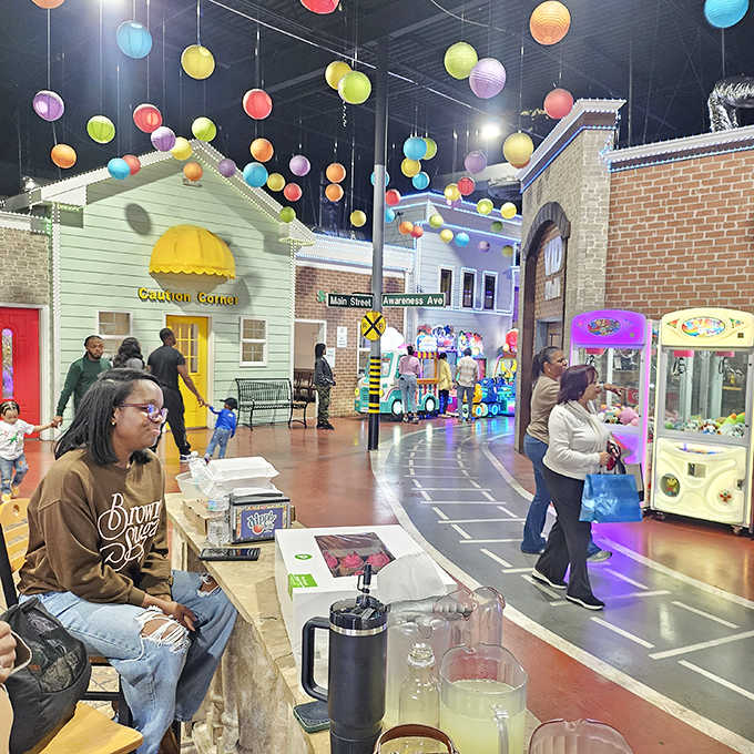 Families gather in the miniature streets, sharing moments that blend quality time with genuinely useful life lessons.