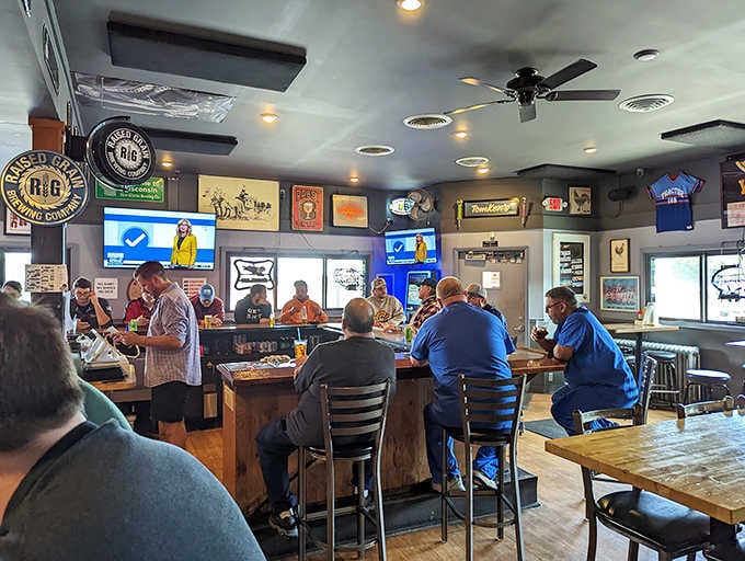 The bar counter where locals gather, stories are shared, and cold drinks flow as freely as the conversation.