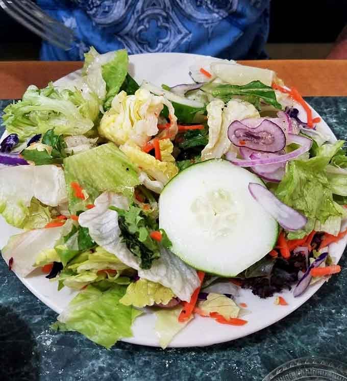 A salad so fresh and colorful, it almost makes you forget about all those other menu items calling your name.