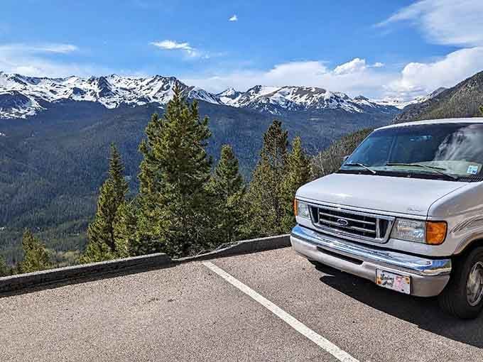 Classic vehicles parked at scenic overlooks prove this legendary drive has been turning heads since your parents were taking road trips together.