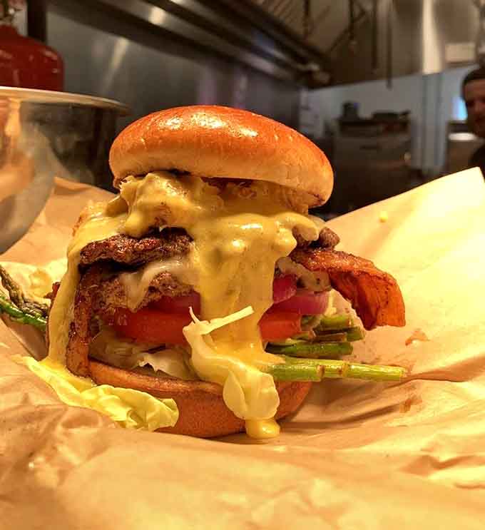 That smash burger is stacked so high it requires engineering skills just to take a bite.