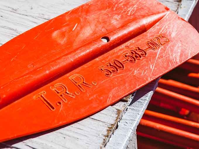 Bright orange paddles at Truckee River Raft Co promise fun floating adventures, sunny California afternoons, and unforgettable river memories ahead. Photo credit: Truckee River Raft Co.