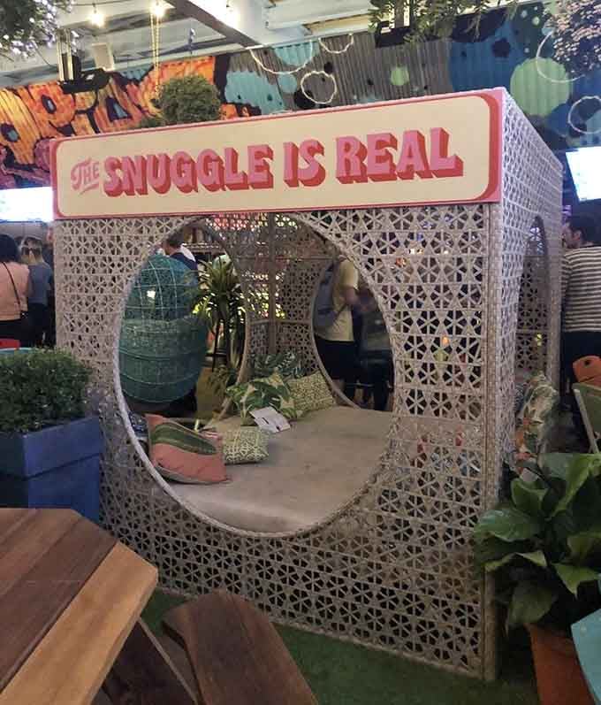 "The Snuggle Is Real" isn't just a sign&mdash;it's a lifestyle choice at this cozy corner of paradise.