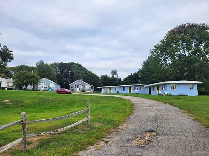 These cheerful blue cottages look like they escaped from a children's book and decided to stay permanently here.