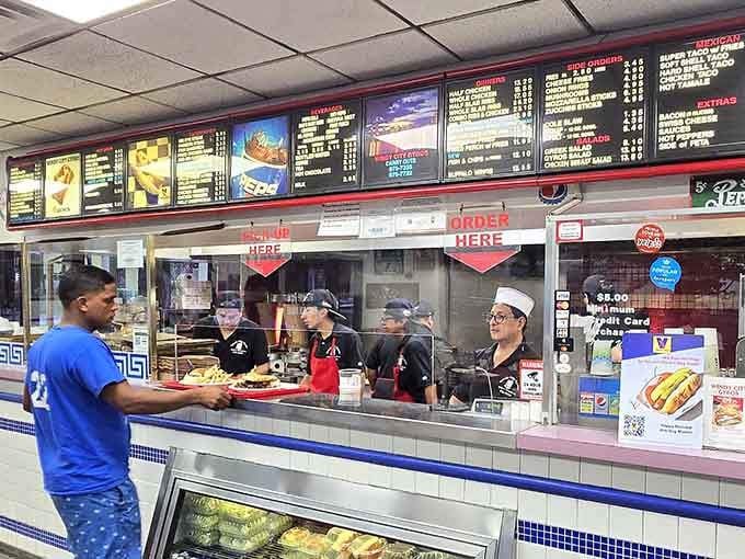Behind that counter, a dedicated team turns simple ingredients into the kind of food that builds loyal followings.