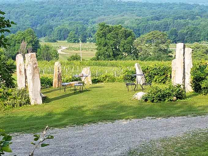Standing stones frame pastoral valley views, offering the perfect spot to contemplate life's mysteries or just relax.