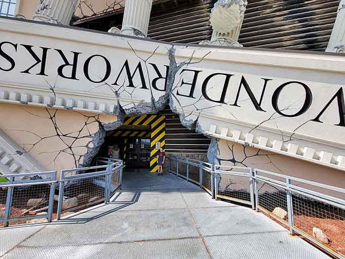 The entrance literally looks like the building crashed and decided to stay, creating Branson's most photographed facade.