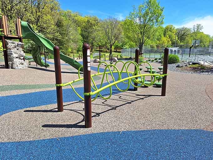 Curved climbing structures create pathways that work for different abilities, turning limitations into launching pads for fun.