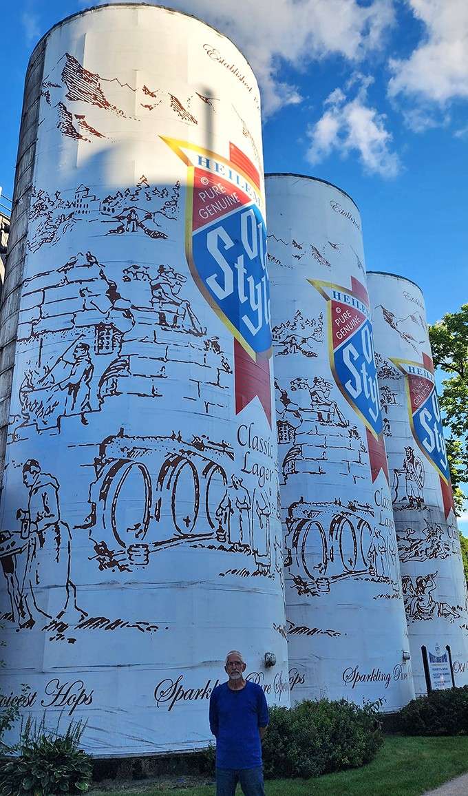 Standing at the base looking up, you truly grasp the audacious scale of painting storage tanks like beer cans.