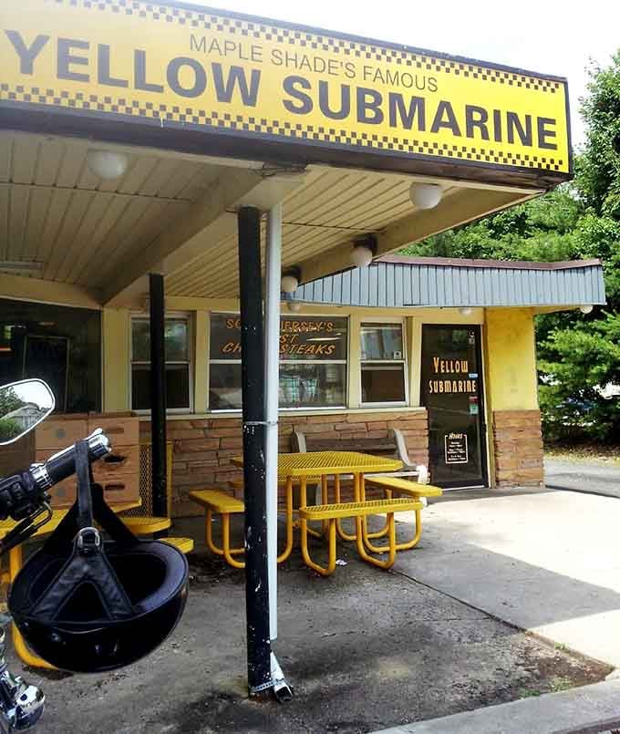 Yellow outdoor seating that matches the vibe perfectly, inviting you to dine al fresco like it's 1965 all over.