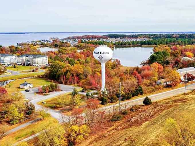 The water tower announces this island community like a welcome sign visible from miles away across the bay.