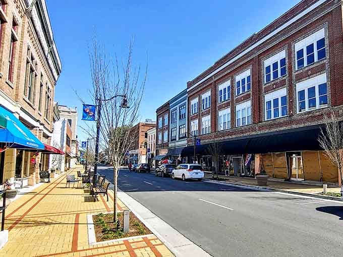 Clean streets and brick facades create an inviting downtown that makes window shopping feel like an adventure.