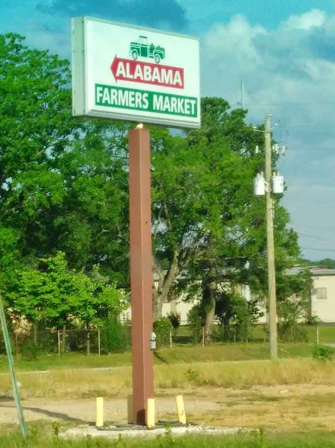 That roadside sign stands proud, marking the spot where your grocery budget goes to die happy.